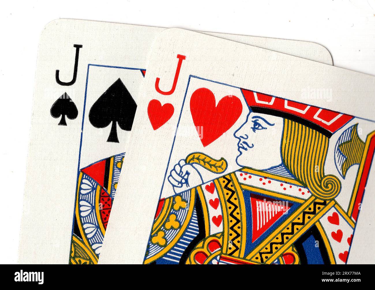 Vintage playing cards showing a pair of jacks on a white background ...