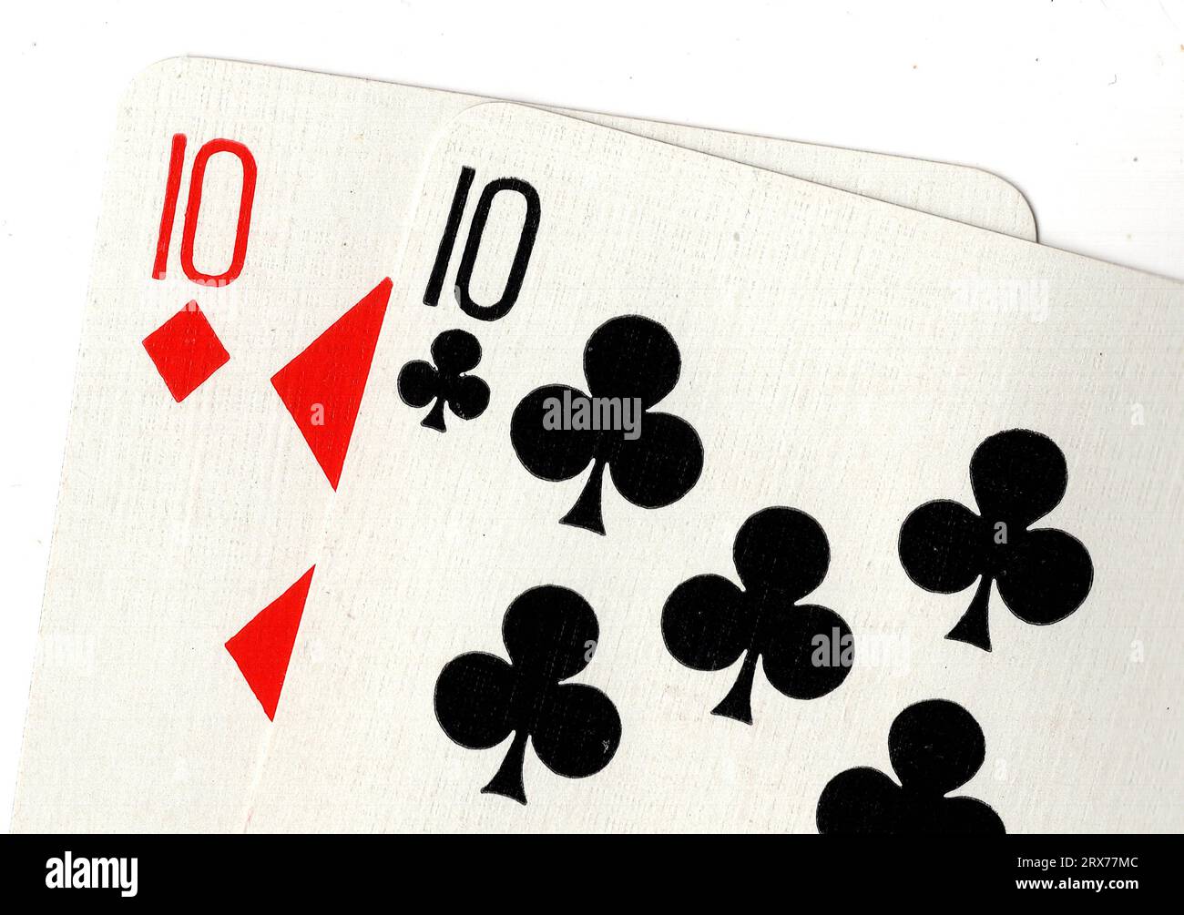 Vintage playing cards showing a pair of tens on a white background ...