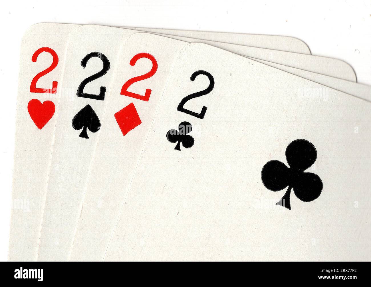 Vintage playing cards showing four twos on a white background Stock ...
