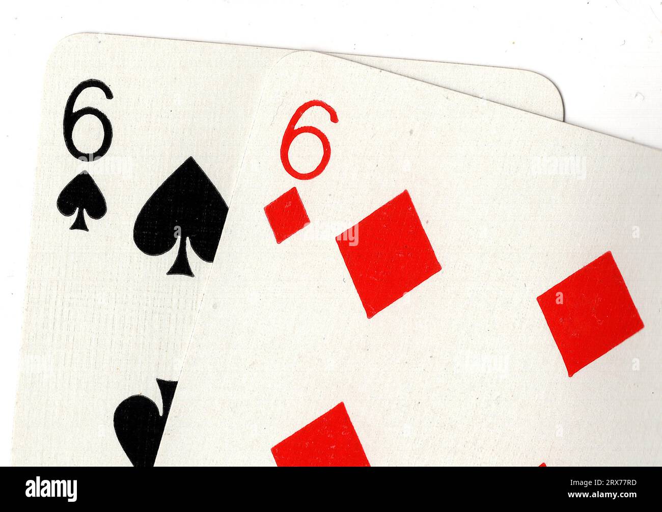 Vintage playing cards showing a pair of sixes on a white background ...