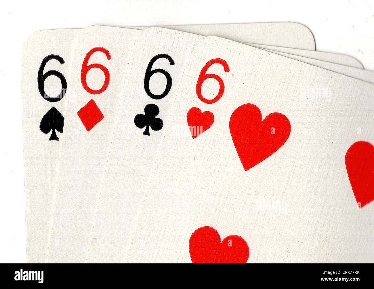Vintage playing cards showing four sixes on a white background Stock ...