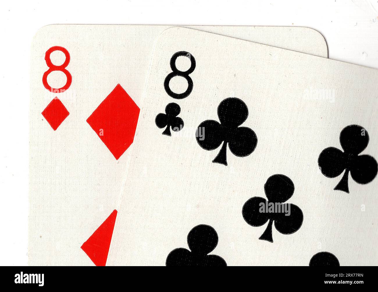 Vintage playing cards showing a pair of eights on a white background ...