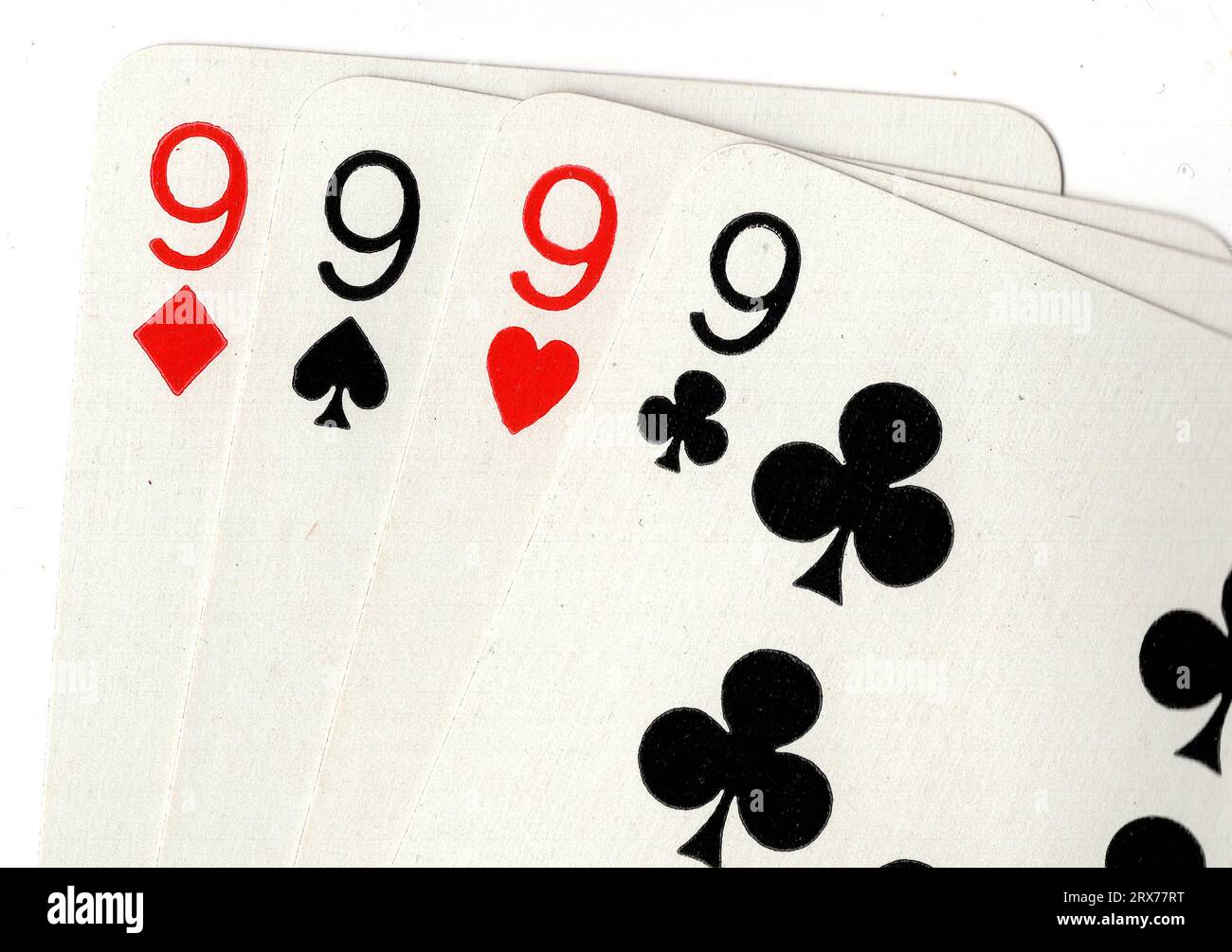 Vintage playing cards showing four nines on a white background Stock ...