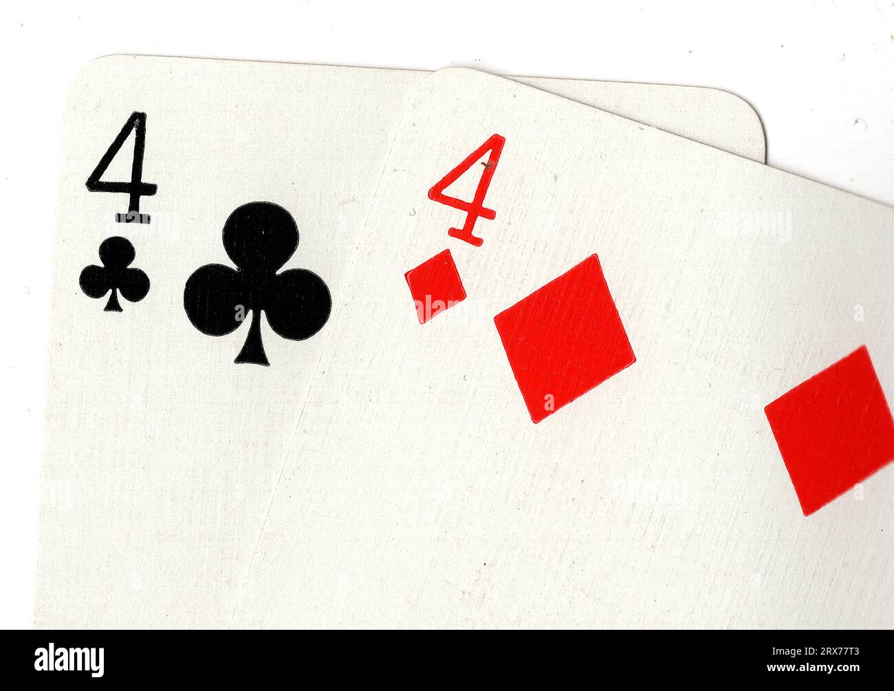 Vintage playing cards showing a pair of fours on a white background ...