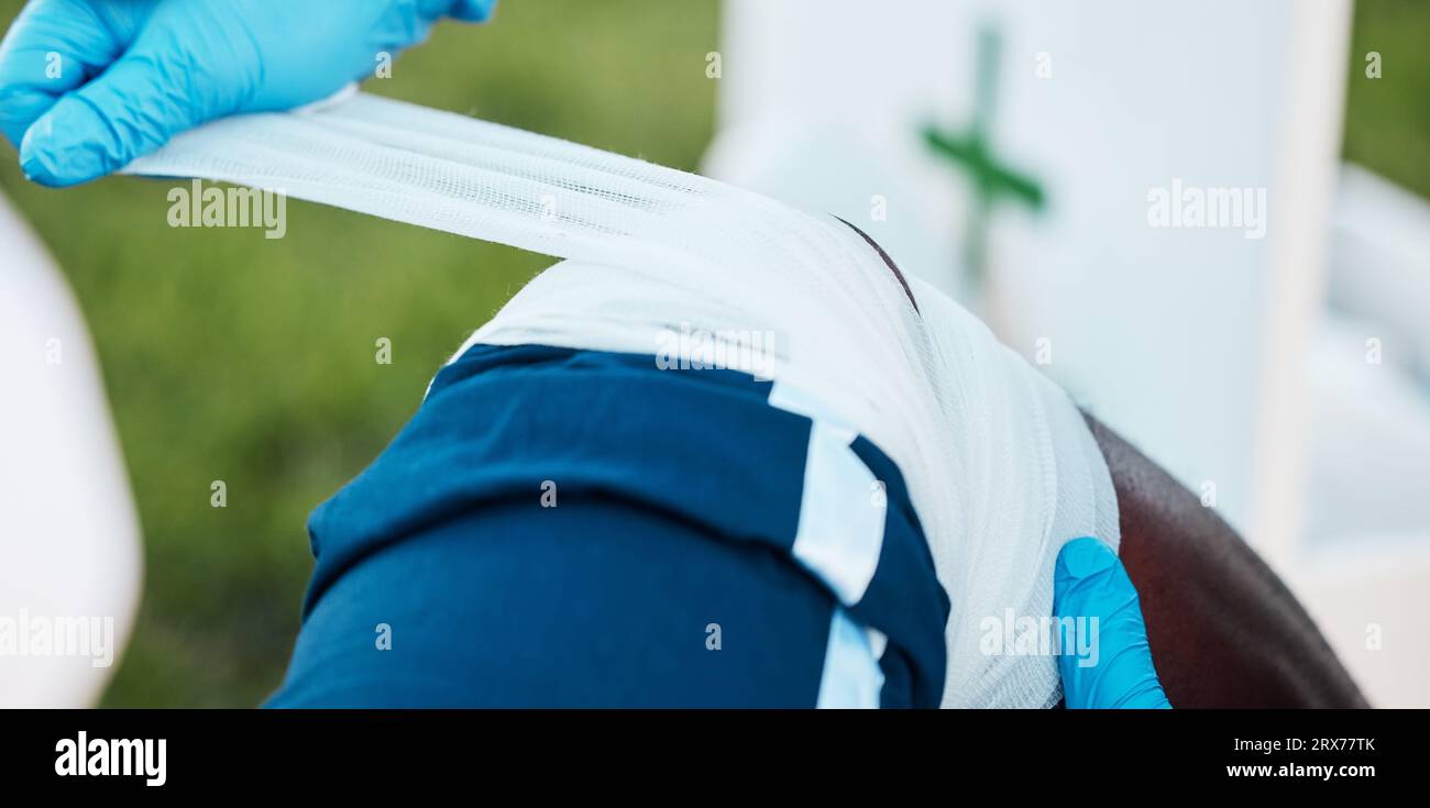 Sports, injury and person with bandage for knee pain, emergency and ...