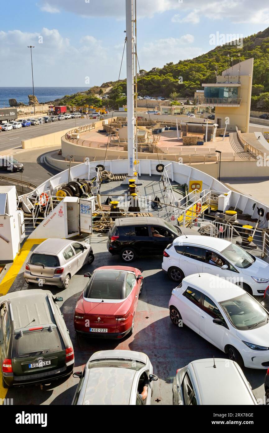Gozo, Malta - 5 August 2023: Cars parked on the deck of a car ferry in ...
