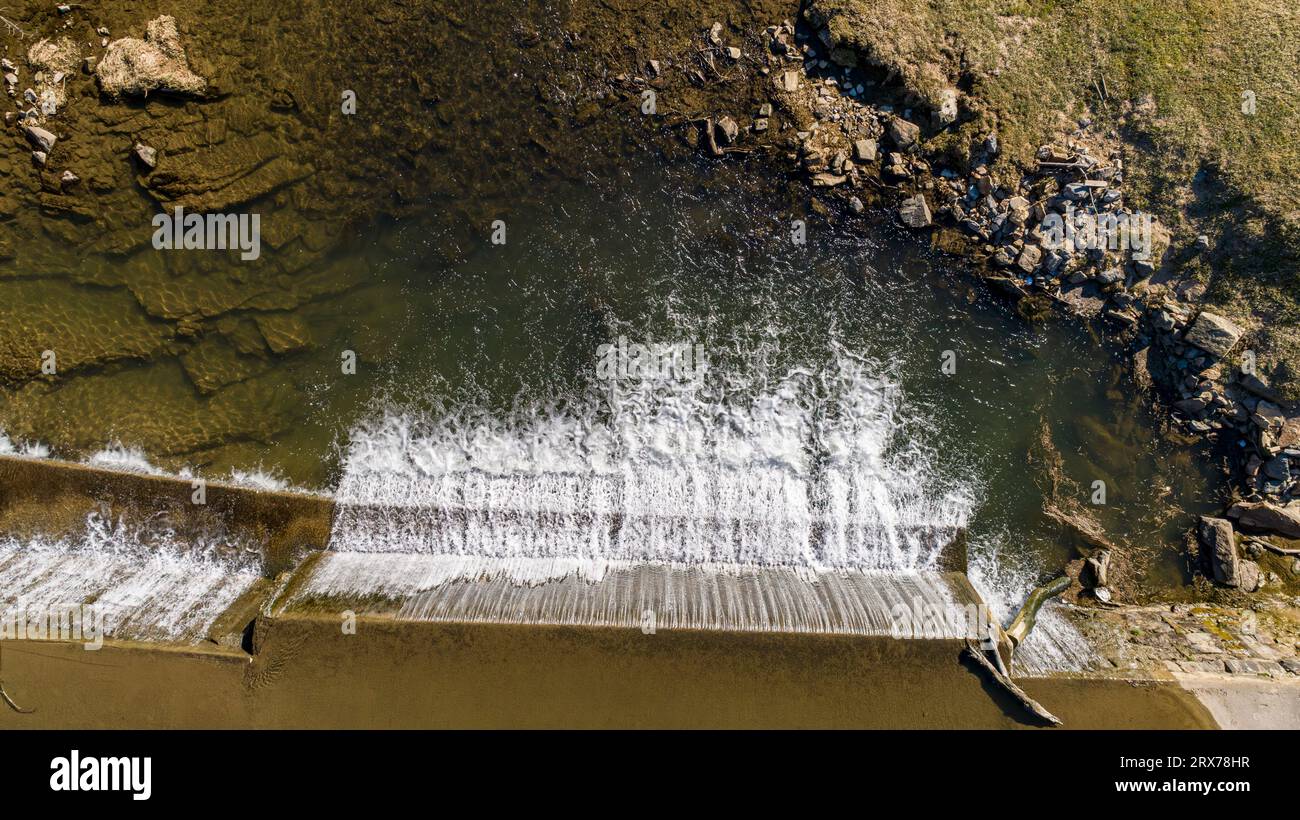 An Aerial Downward View of a Man Made Waterfall for a Mill, on a Sunny ...