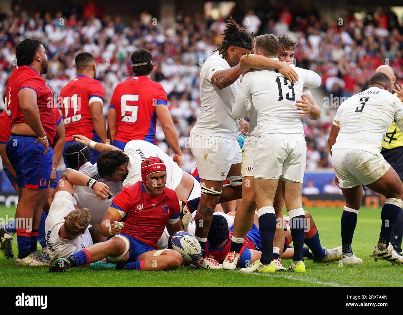 England's Theo Dan (right) celebrates scoring their side's second try ...