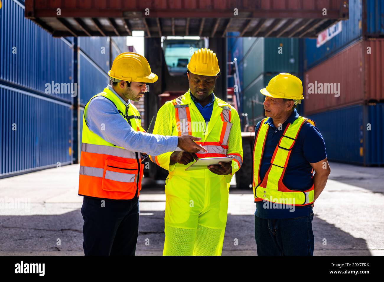 Warehouse engineer worker checking and working at industrial container ...