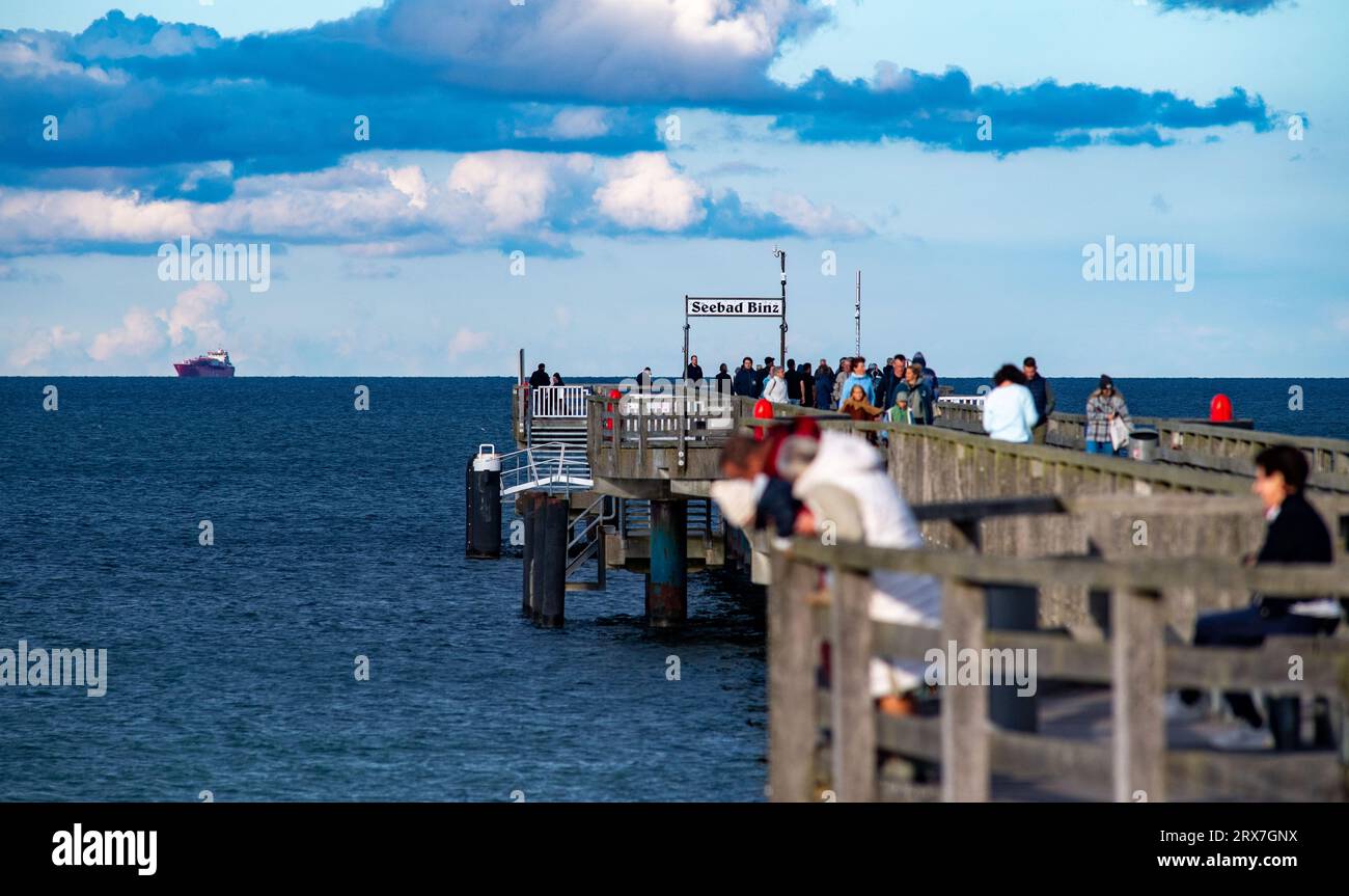 Binz, Germany. 23rd Sep, 2023. People walk across the pier of the ...