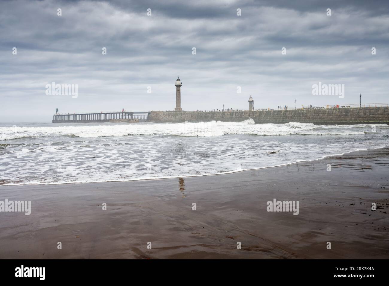 Whitby,England,9,August,2023.The Picture Shows ,The East and West Piers ...