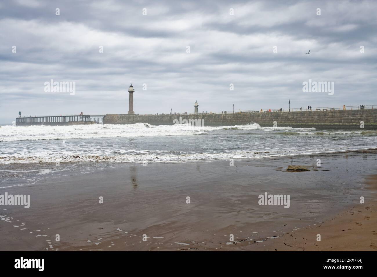 West Pier as seen from Whitby Beach Stock Photo - Alamy