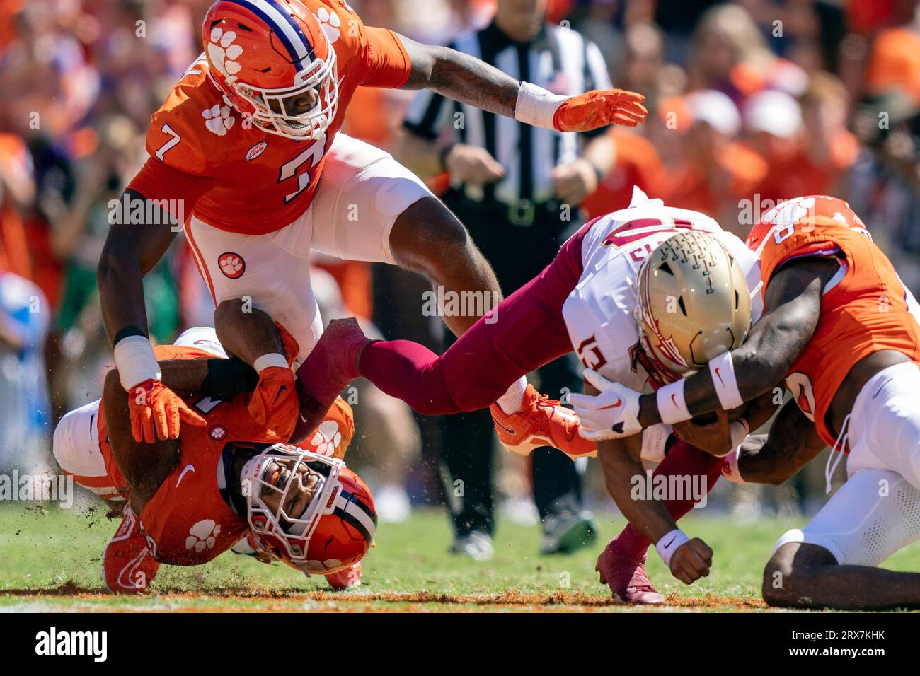 Clemson linebacker Jeremiah Trotter Jr., bottom left, and cornerback ...