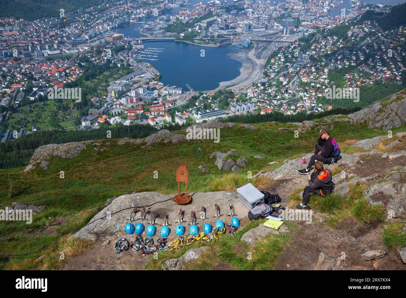 Bergen, Norway, June 23, 2023: Zip-line guides wait at the summit of ...