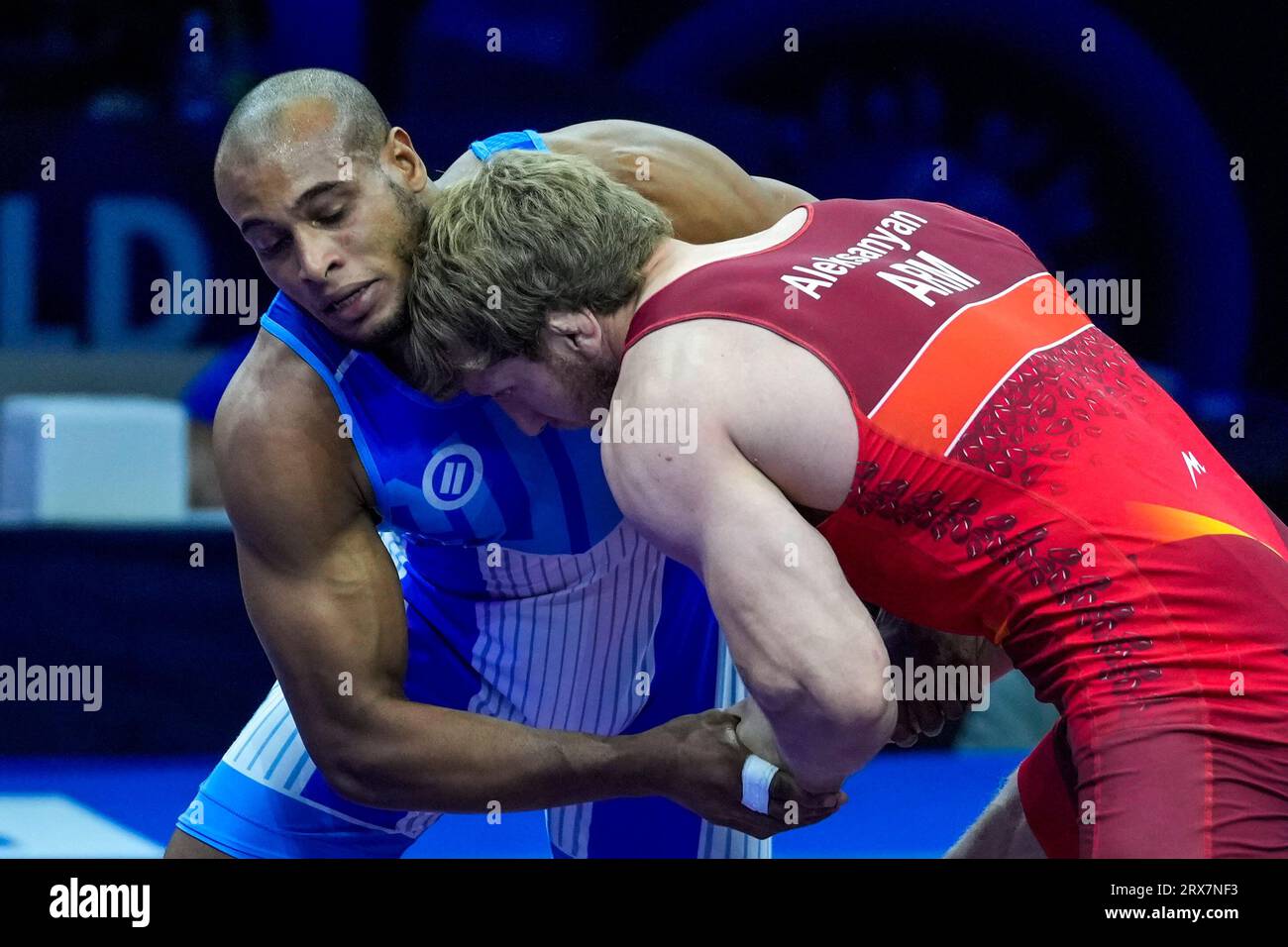 Cuba's Gabriel Alejandro Rosillo Kindelan, blue, and Armenia's Artur ...