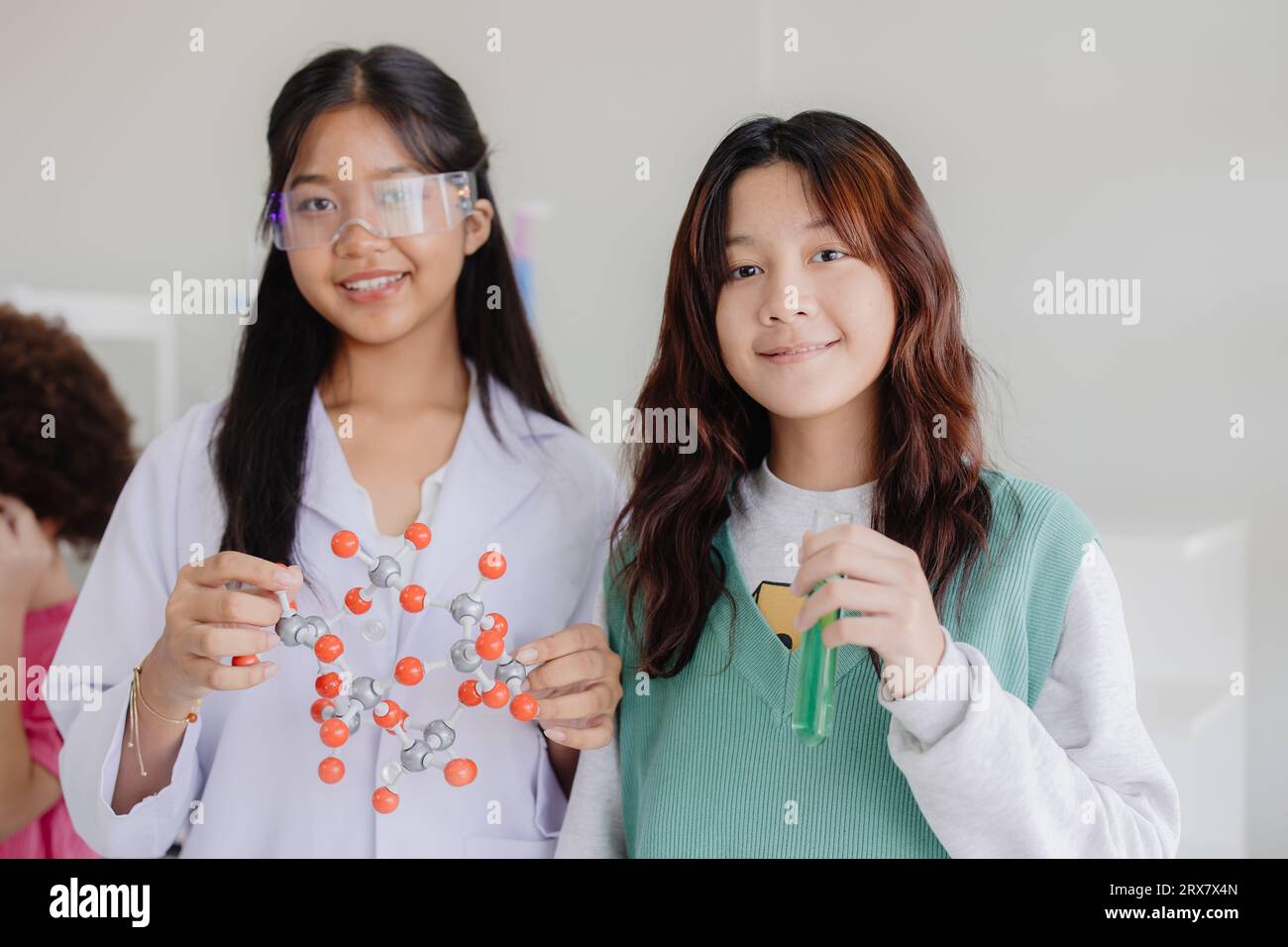 Portrait smart young asian teen girl enjoy learning and play in school ...