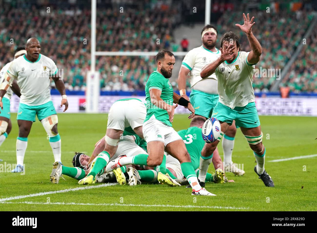 Ireland's Jamison Gibson-Park attempts to clear the ball from South ...