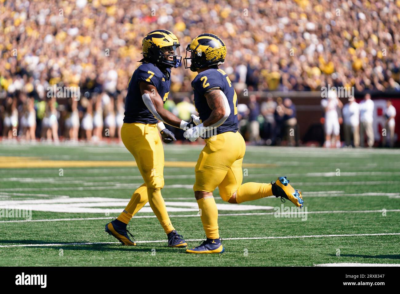 Michigan running back Blake Corum (2) celebrates his touchdown with ...