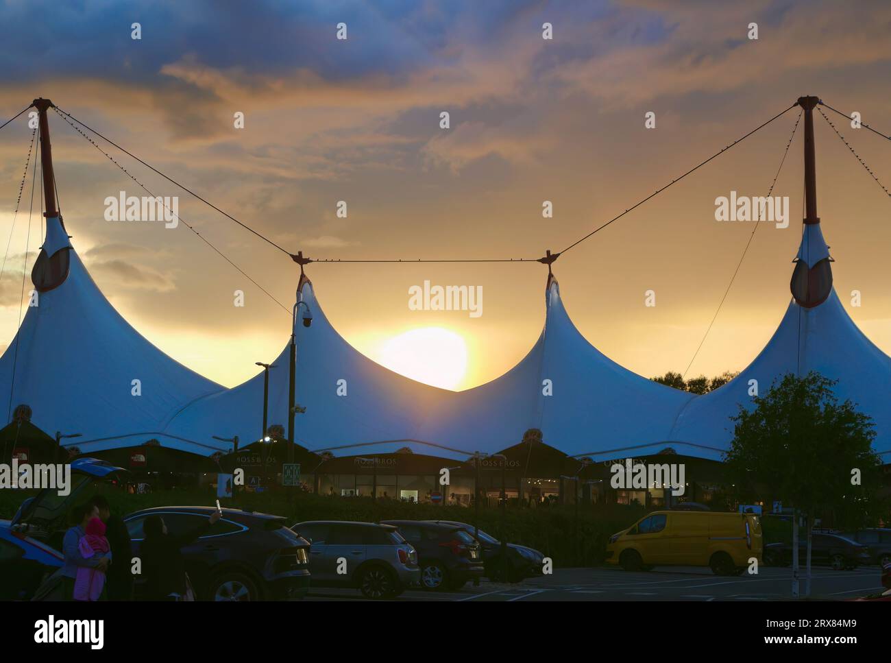 View across the car park at Ashford Designer Outlet shopping centre ...