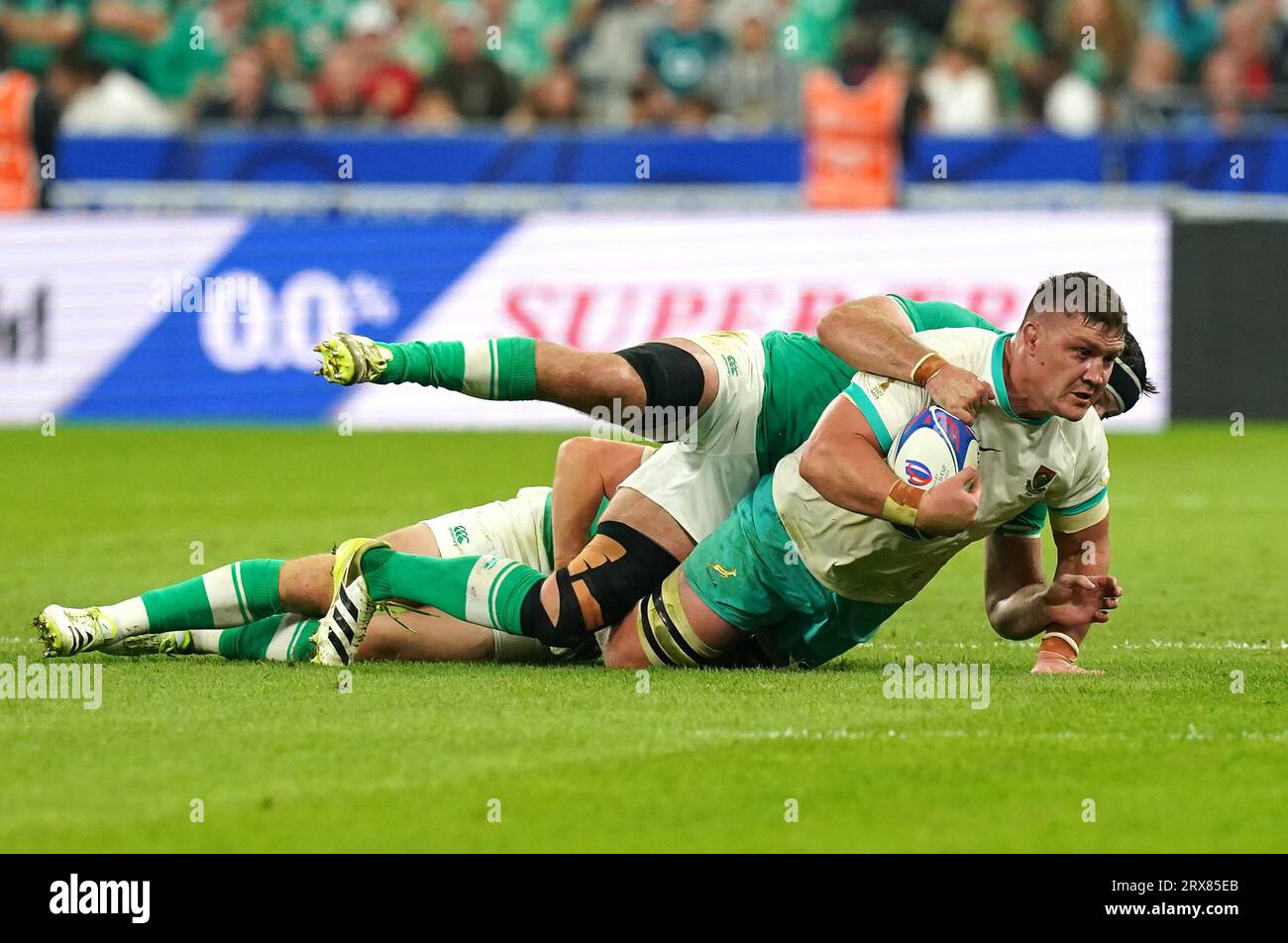 South Africa's Jasper Van der Weshuizen Wiese (right) is tackled by ...