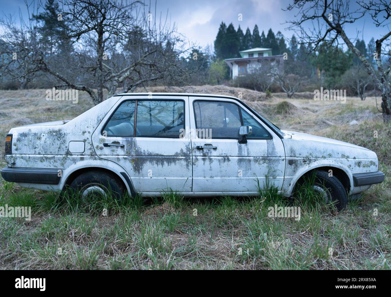 Old and discarded car Stock Photo - Alamy