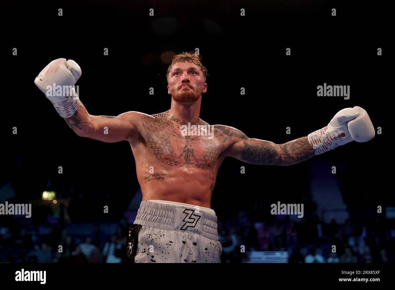 Zach Parker celebrates after the fight is halted against Khalid Graidia ...