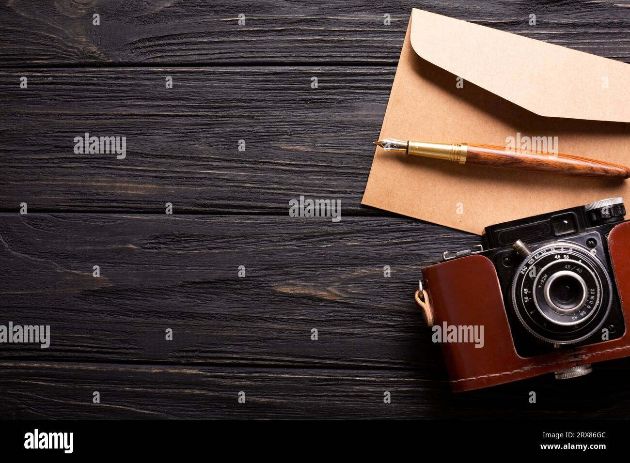 An envelope with a place for an inscription, a beautiful camera and a ...