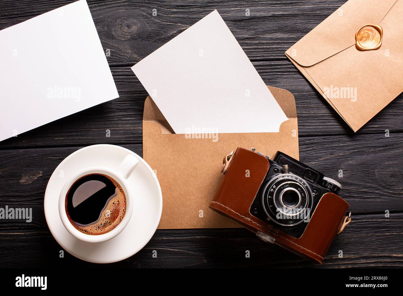 An envelope with a place for an inscription, a beautiful camera and a ...