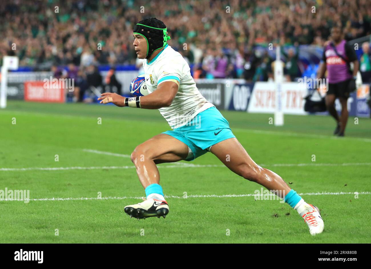 South Africa's Cheslin Kolbe on his way to scoring his side's first try ...