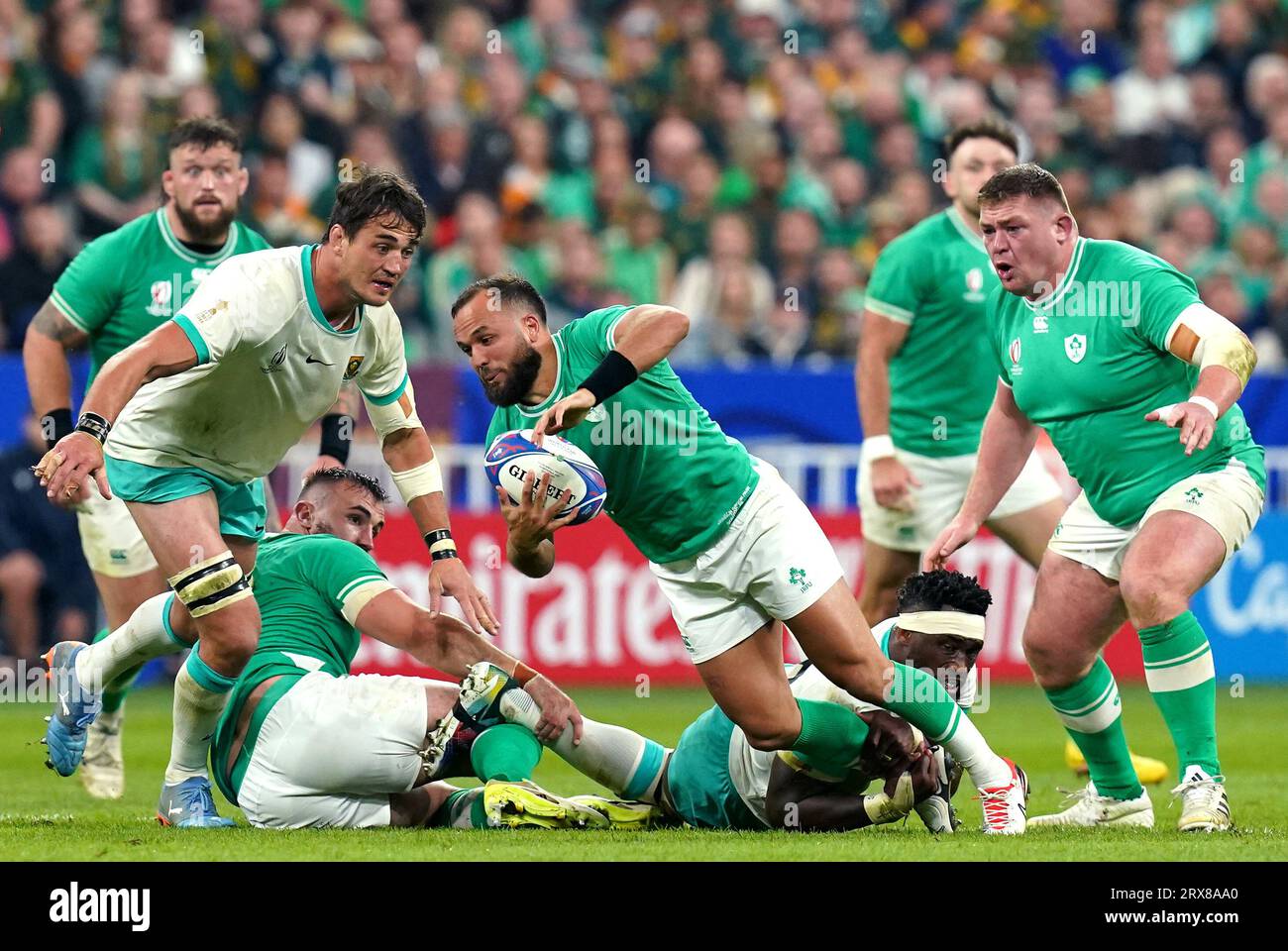 Ireland's Jamison Gibson-Park (centre) attempts to hold onto the ball ...