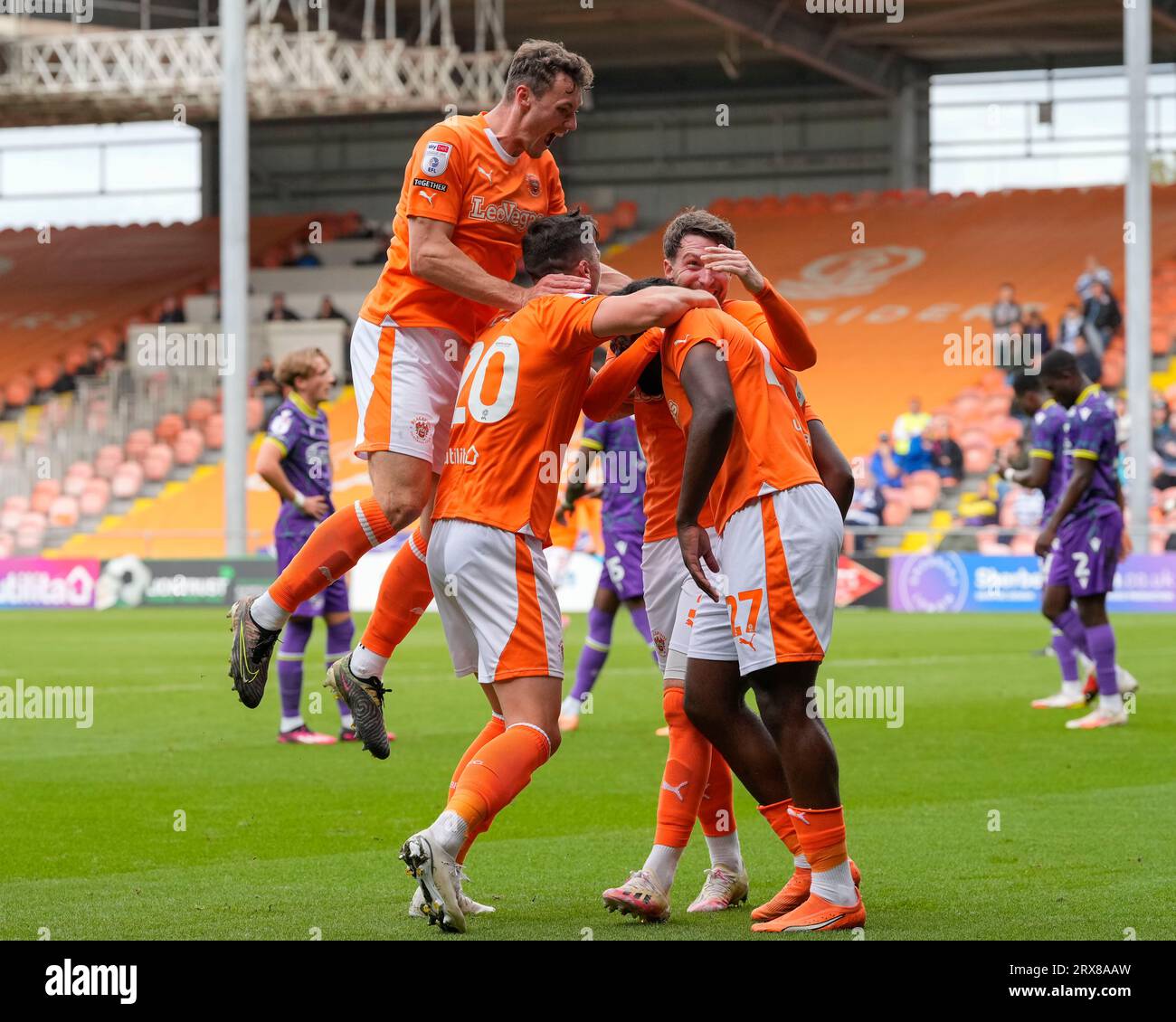 Blackpool players celebrates with goalscorer Kylian Kouassi #27 of ...
