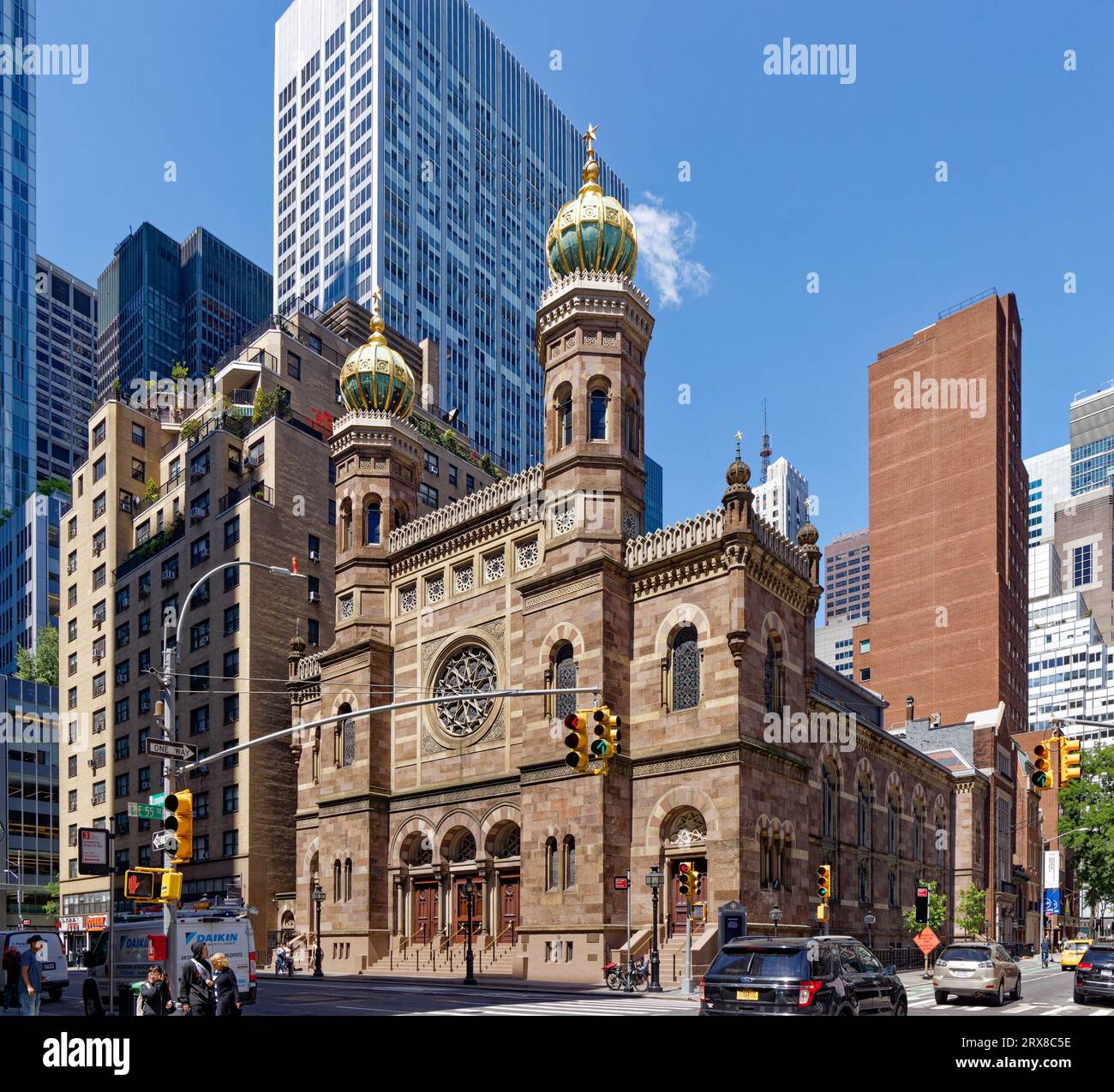 Gilded green globes crown the brownstone towers of Central Synagogue, a ...