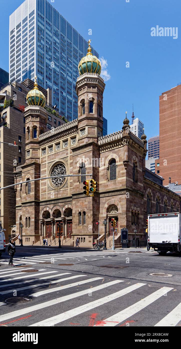 Gilded green globes crown the brownstone towers of Central Synagogue, a ...