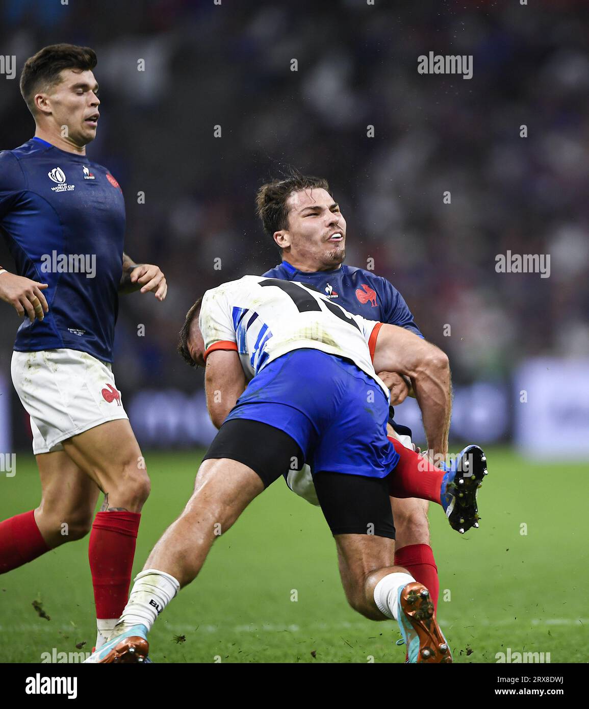 Antoine Dupont is tackled shock tackle by Johan Deysel during the Rugby ...