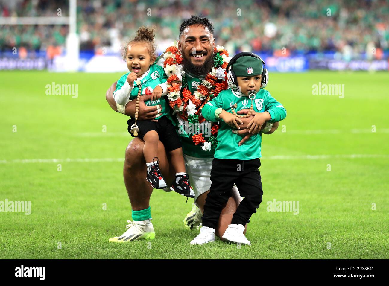 Ireland's Bundee Aki celebrates with his kids after the final whistle ...