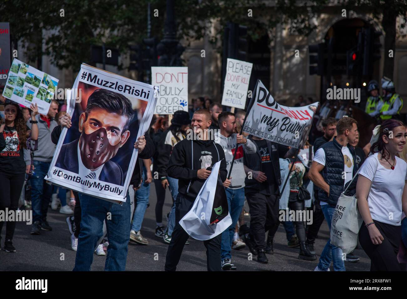 London, UK. 23rd Sep, 2023. Protestors hold placards during the XL ...