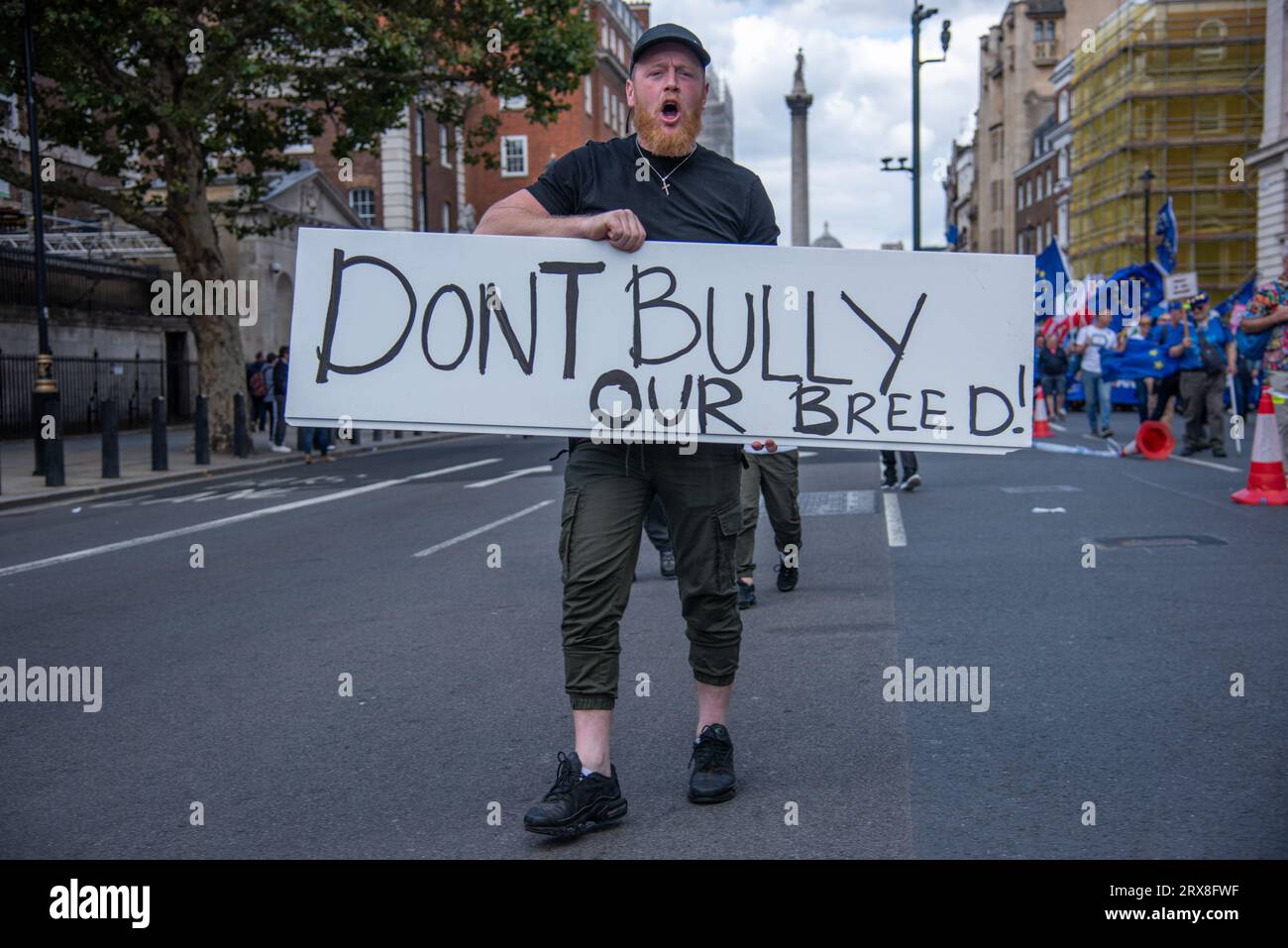 London, UK. 23rd Sep, 2023. A protestor holds a placard during the XL ...