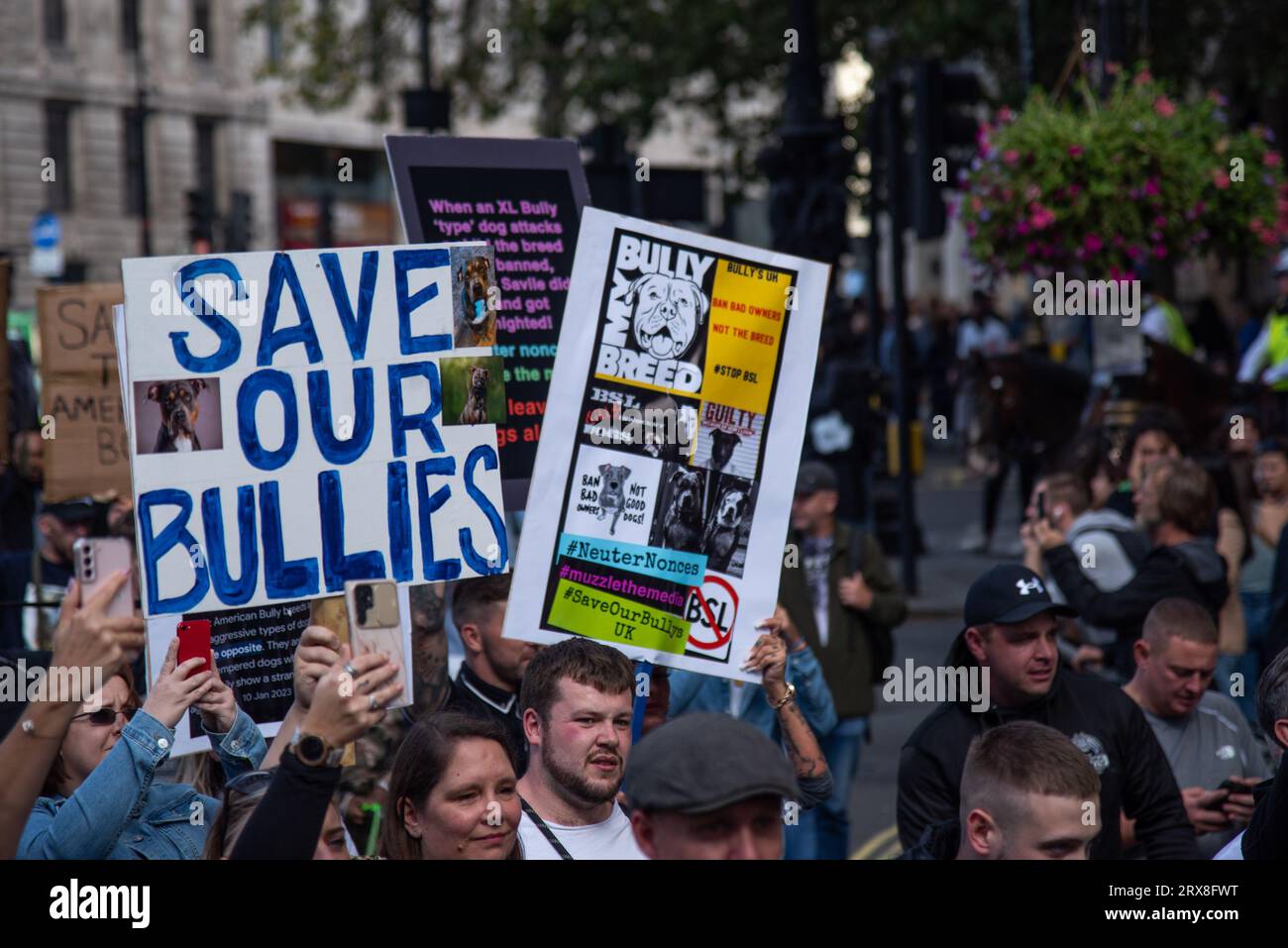 London, UK. 23rd Sep, 2023. Protestors hold placards during the XL ...