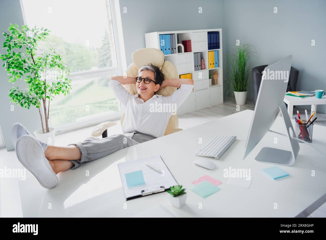Full body photo of web ui ux designer mature woman lying leather ...