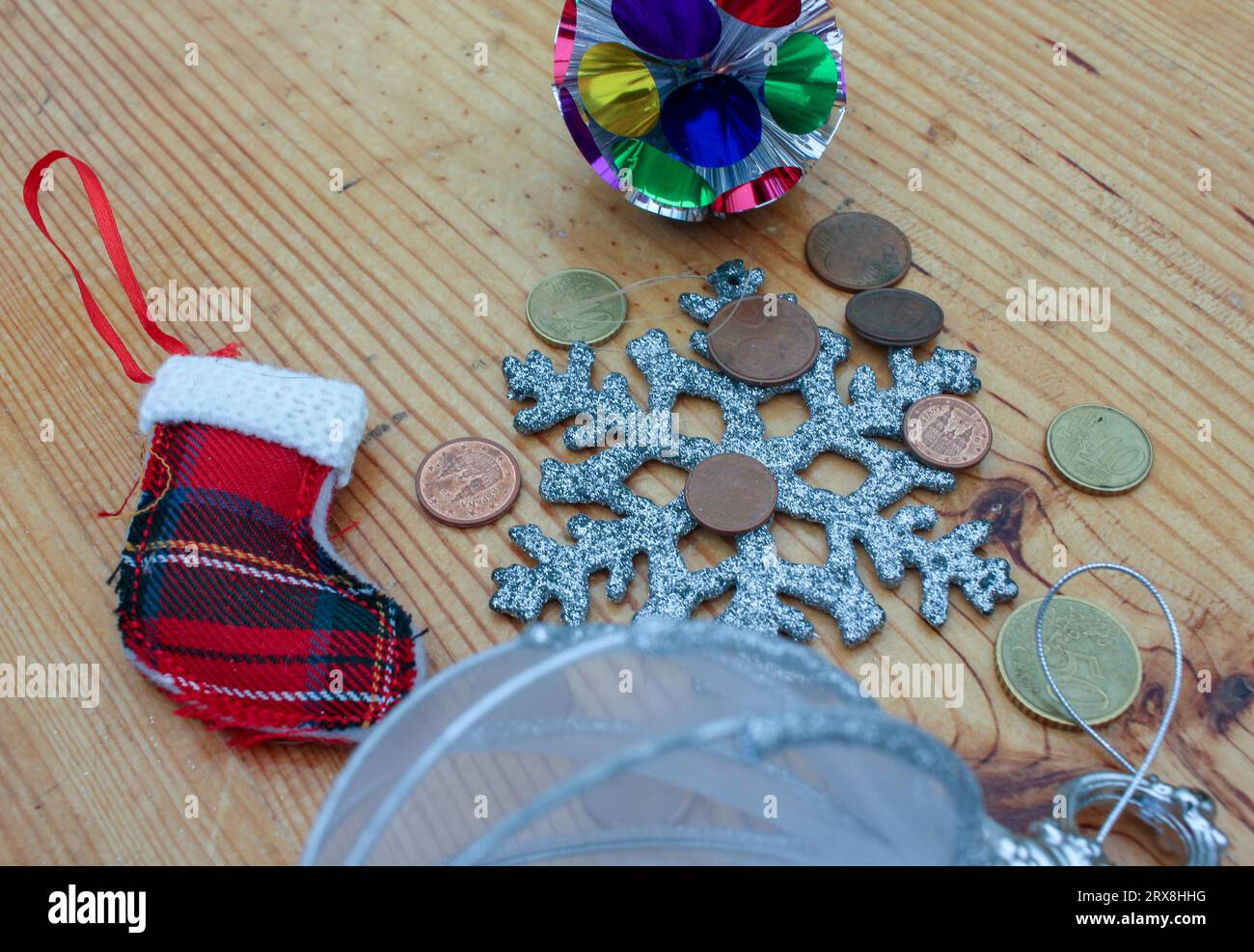ready to buy christmas presents with euro coins Stock Photo - Alamy