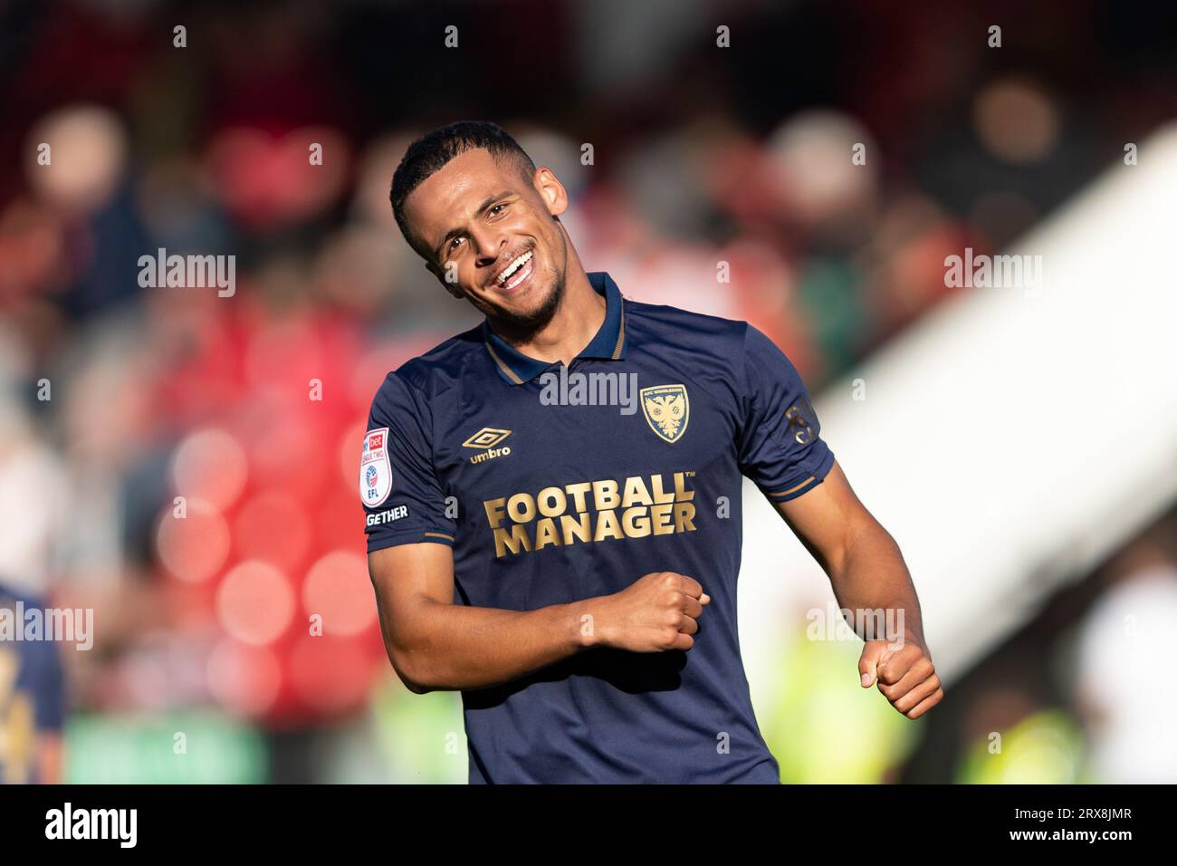 Ali Al-Hamadi of AFC Wimbledon celebrates scoring their side's third ...