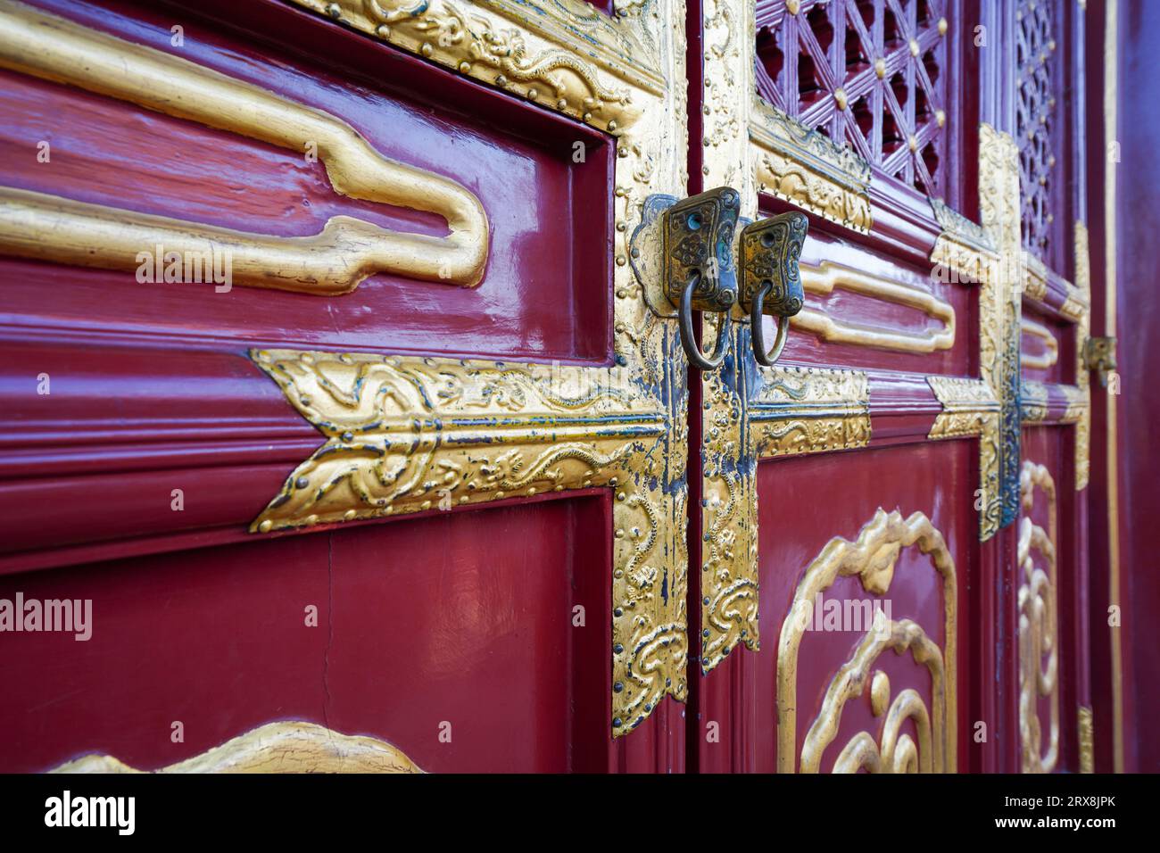 Gilded decoration on wooden windows of Tibetan ancient buildings in ...