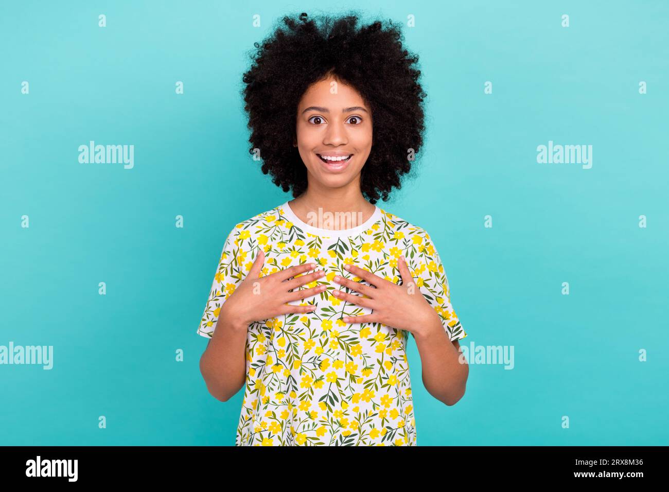 Photo of impressed positive girl wear trendy clothes hands chest ...