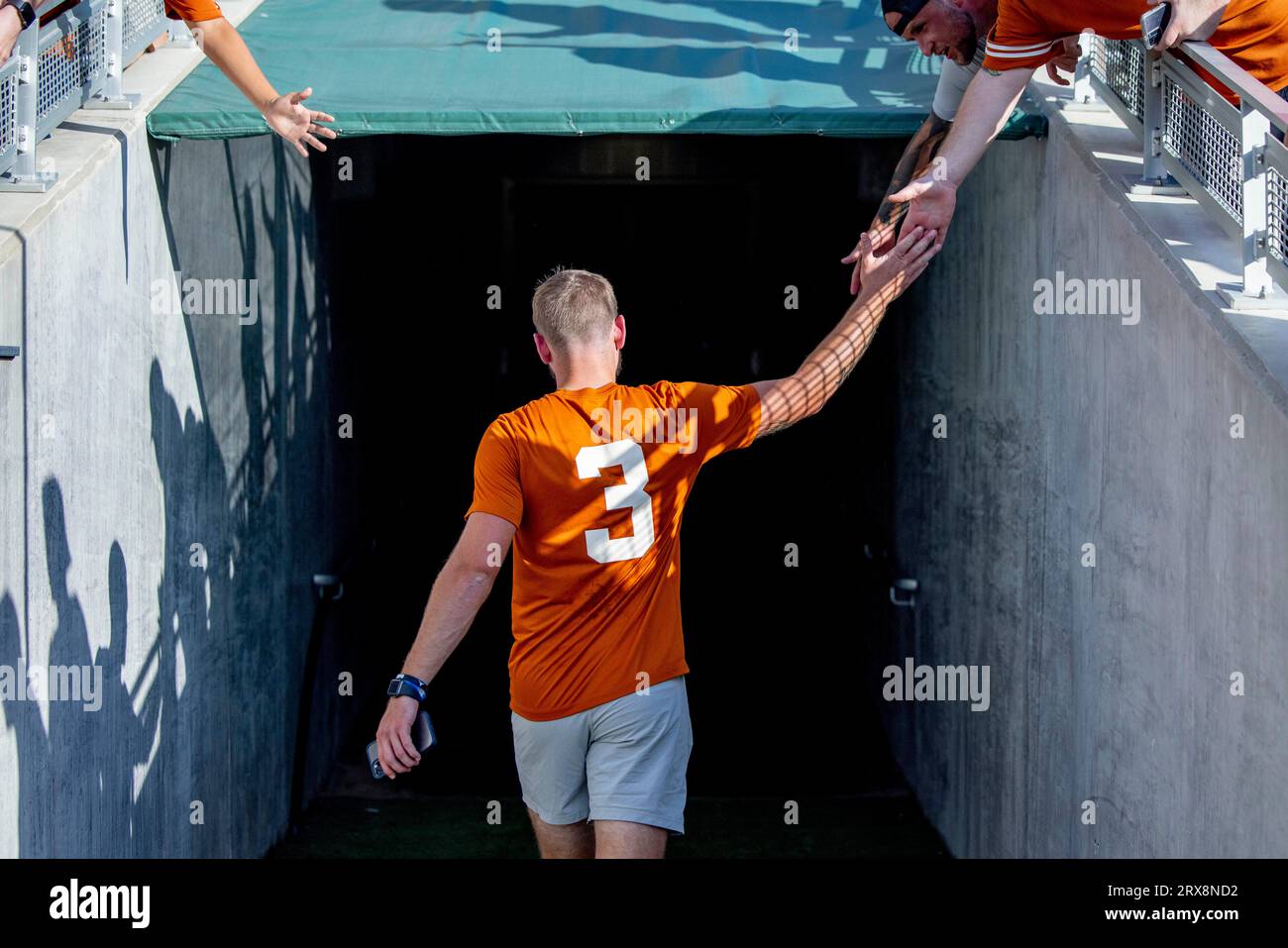 Texas quarterback Quinn Ewers walks to the locker room before the team ...