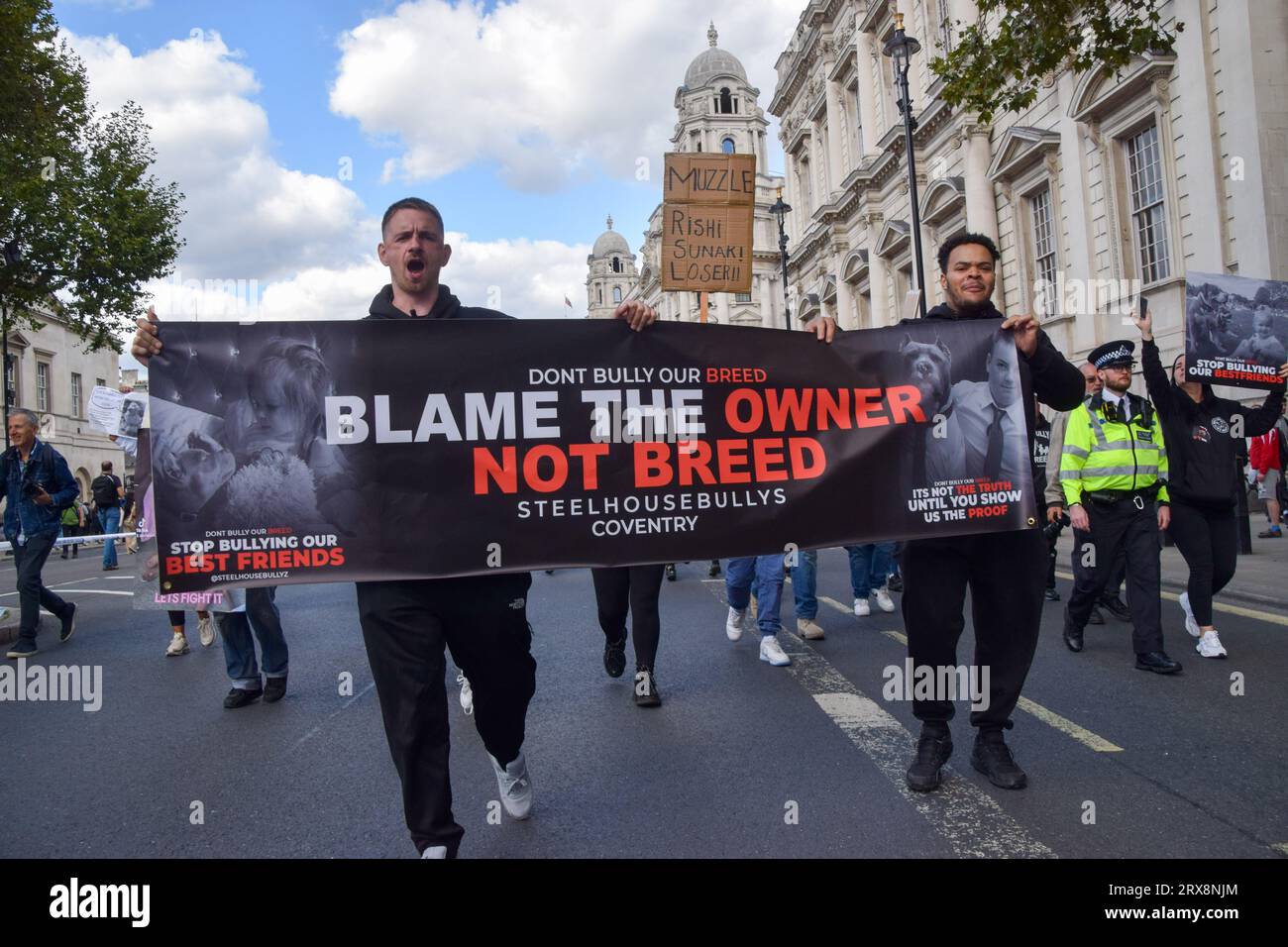 London, UK. 23rd Sep, 2023. Protesters hold a banner which states ...
