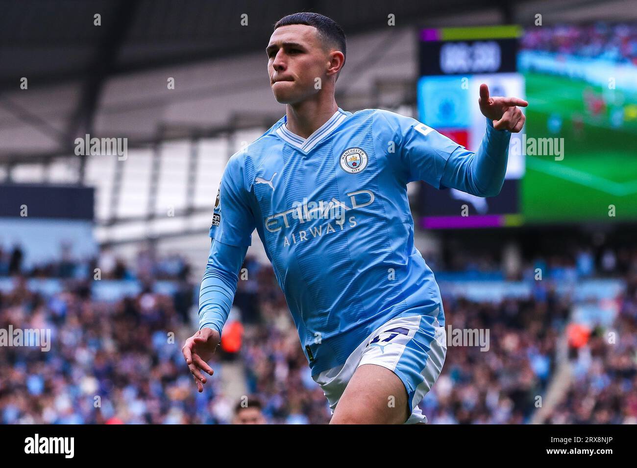 Phil Foden of Manchester City celebrates his opening goal during the ...