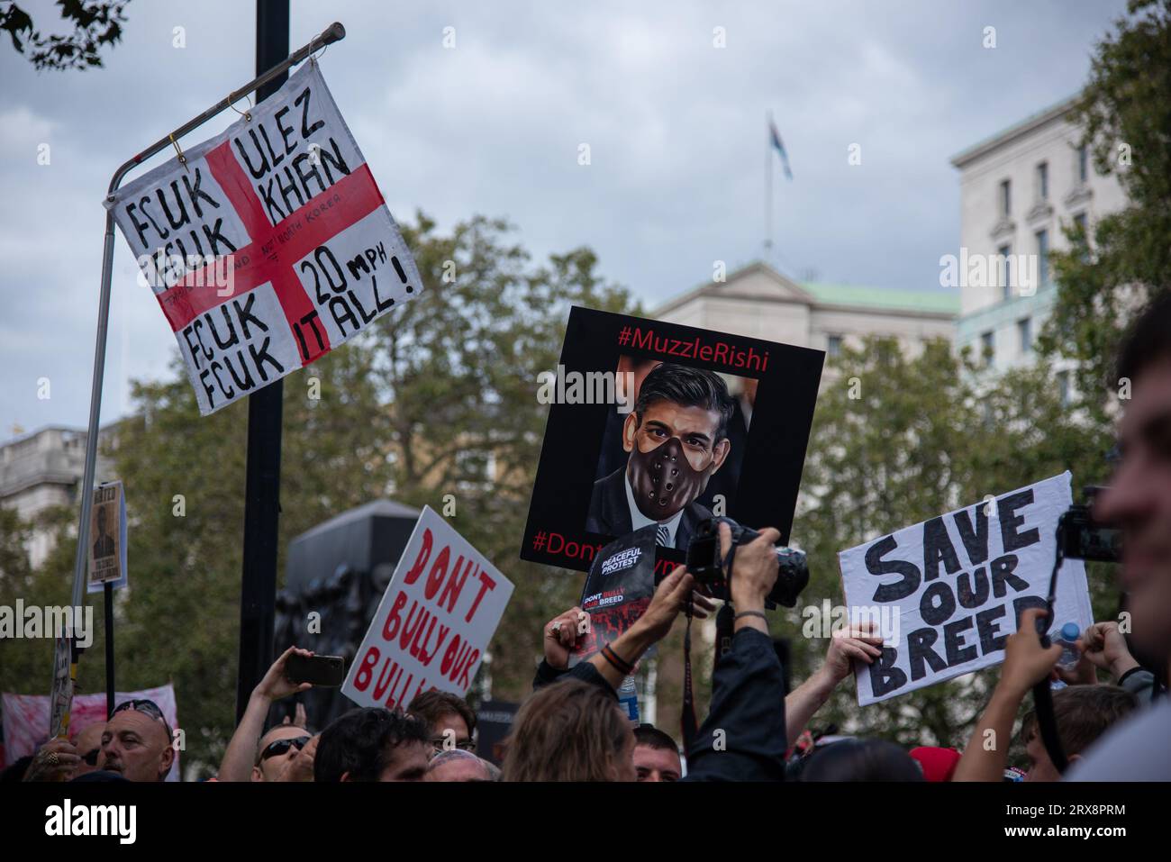 London, UK. 23rd Sep, 2023. Protesters hold placards expressing their ...