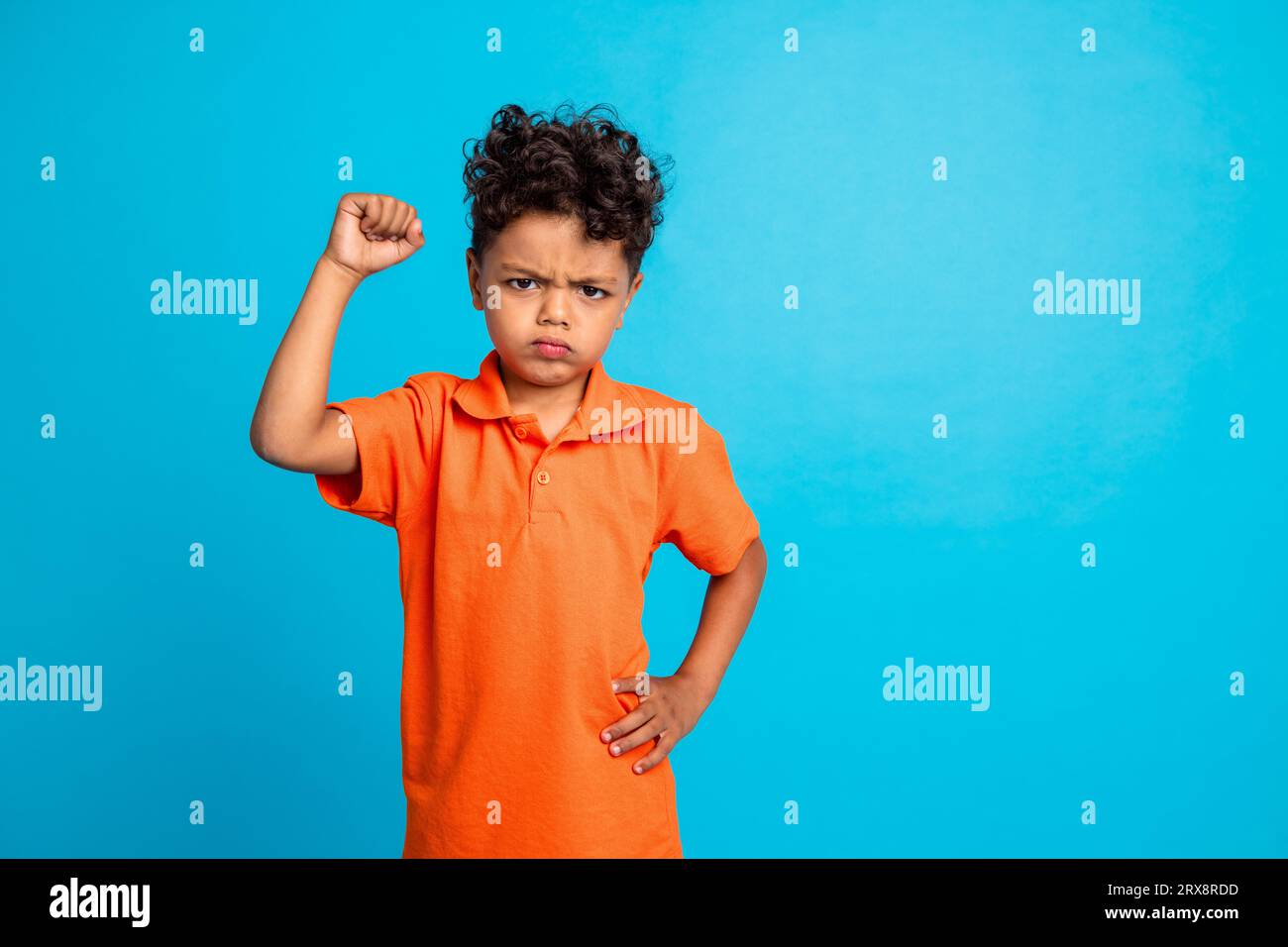 Photo of frustrated kid boy raise fist up fight for human children ...