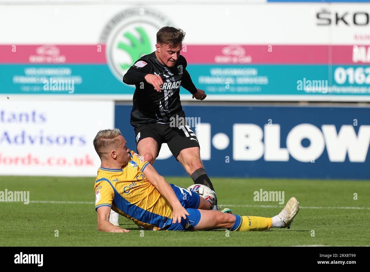 Barrow's Robbie Gotts battles for possession Mansfield Town's Louis ...