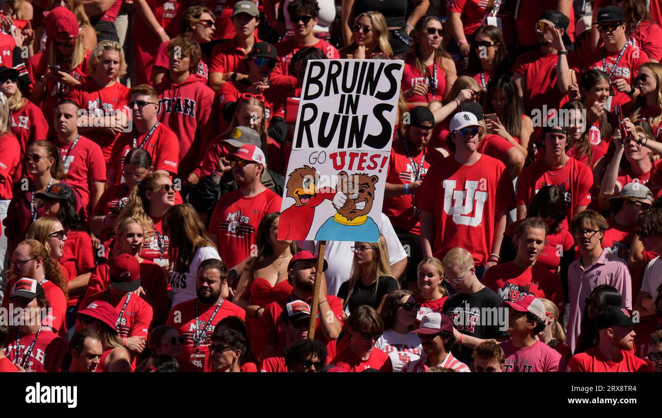 Utah fans show their support during the first half of an NCAA college ...